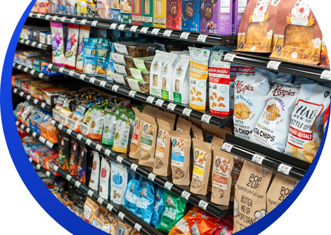 A grocery store shelf filled with products source from Mable.